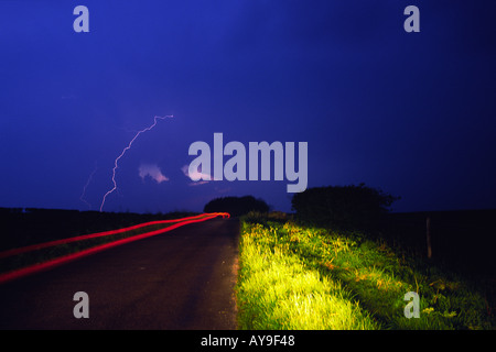 A lightning strike in the passing storm on the Kent Downs near Hythe ...