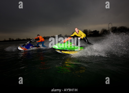 Two men racing jet skis, speed and rivalry Stock Photo - Alamy