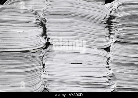 Stack of newspapers tied in bundles UK Stock Photo - Alamy