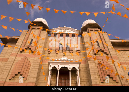 Facade of Sikh temple adorned with flags for festival of Vaisakhi Sri ...