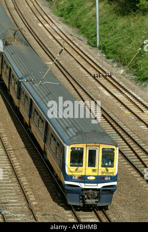 Thameslink class 319 train travelling through the british countryside ...
