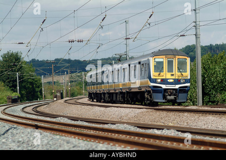Thameslink class 319 train travelling through the british countryside ...