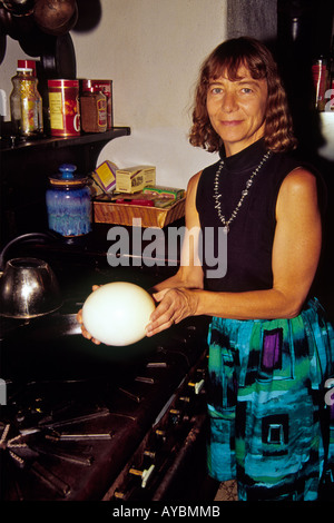 Woman in bed with big black doberman dog and laptop Stock Photo - Alamy