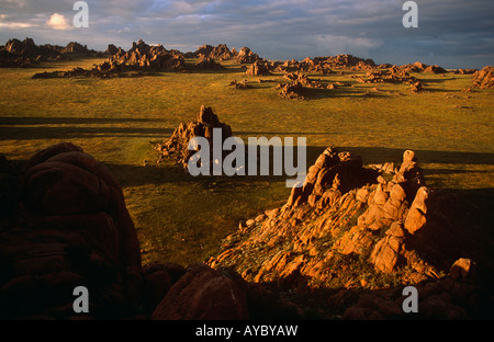 Mongolia, Dundgobi Province. Rock Towers rise out of the Steppe Stock ...
