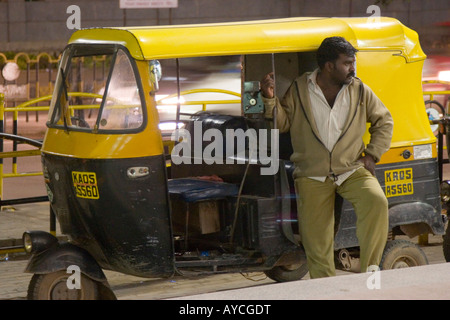 Queue of auto rickshaw taxis and drivers outside a shopping mall in ...