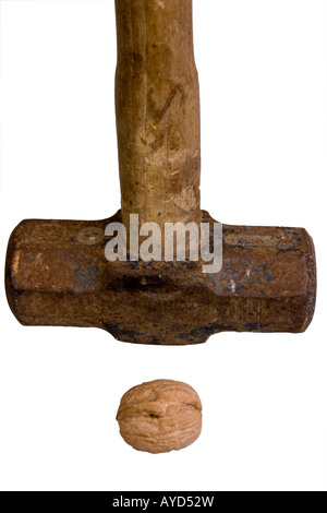 Sledge Hammer Cracking Nuts Stock Photo - Alamy