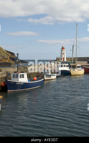 dh Harbour Lighthouse tower LYBSTER CAITHNESS Boats at quayside beacon ...