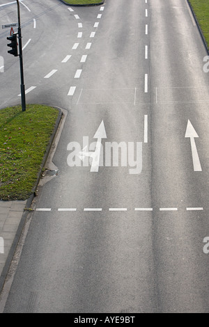 Arrow signs on a road Stock Photo - Alamy