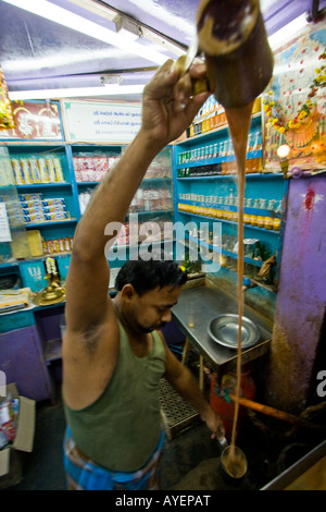 Indian Man Making Chai Tea with a Long Pour in Tiruchirappalli or ...