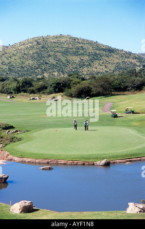 View looking down over golfers at Lost City Golf Course at Sun City ...