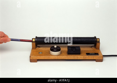 Demagnetizing a magnet Stock Photo - Alamy