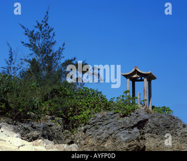 Small shrine beside the beach overlooking the ocean in Okinawa, Japan ...