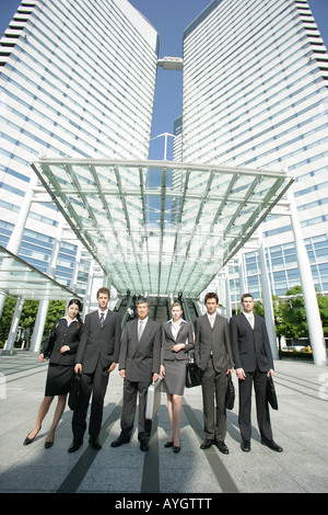 Group of people outside an office building on a clear sunny day Stock ...