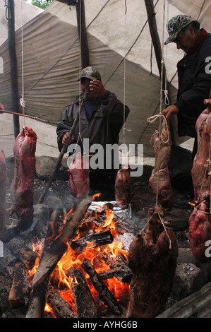 Cree Native Men Cooking wild meat Mistissini Northern Quebec canada ...