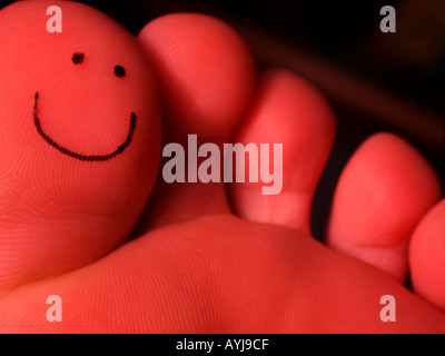 Happy toes and foot smiley Stock Photo - Alamy