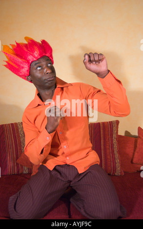 man wearing flame wig Stock Photo - Alamy