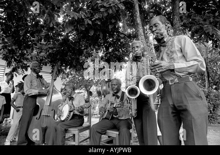 B/W of elderly musicians in a Mento band, a uniquely Jamaican musical ...