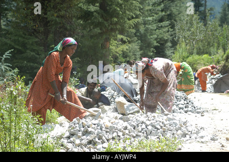women at work at a stone quarry breaking rocks into gravel Stock Photo ...