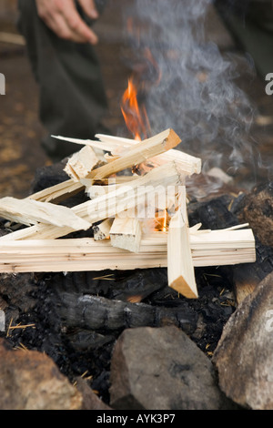 Lighting campfire in hiking area Arctic Circle Hiking Area near ...
