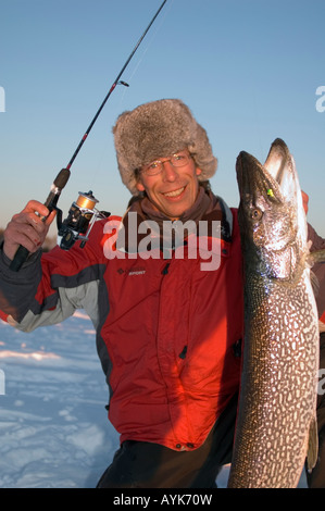 man holds big northern pike Stock Photo - Alamy