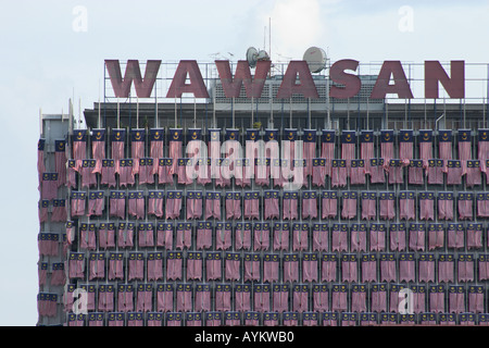 many flags decorate the Angkasapuri building in Malaysia to celebrate ...