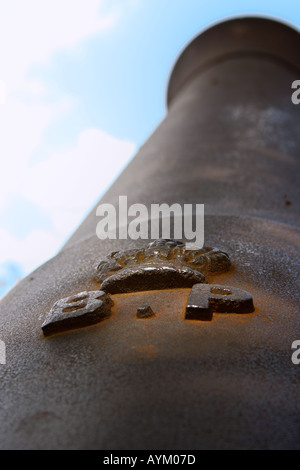 An old cast iron cannon on its mount Stock Photo - Alamy