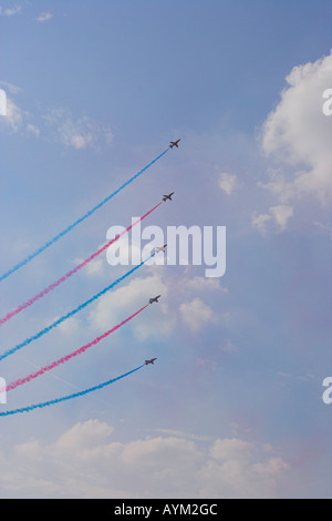 Five of the Red Arrows in formation during a flypast with red, white ...