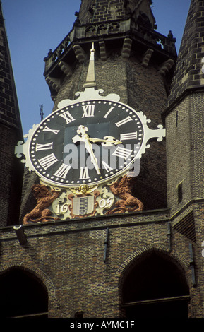 Clock tower of the Oude Kerk in Delft Stock Photo - Alamy
