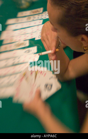 Woman playing canasta Stock Photo - Alamy