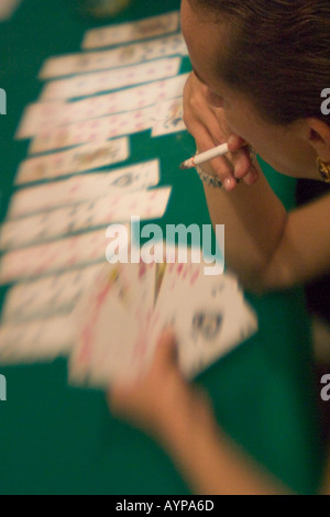 Woman playing canasta Stock Photo - Alamy