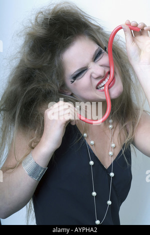 An obnoxious look of a blonde woman as she expresses herself Stock ...