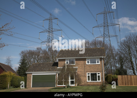 Power lines over houses Stock Photo - Alamy