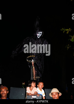 Colourful menacing effigy being carried during ogoh ogoh celebrations ...
