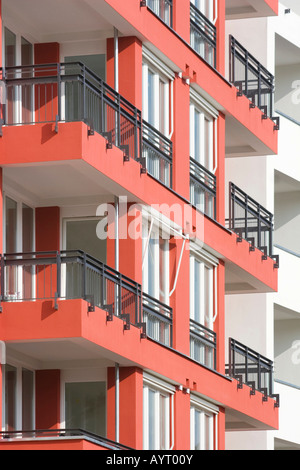 The fassade of an apartment house with several balconies is featured in ...