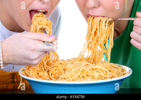 Young Women Eating Spaghetti Model Released Stock Photo - Alamy