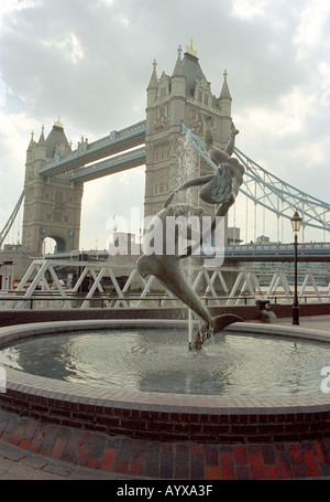 Dolphin and Girl Statue in Front of Tower Bridge, London, UK Stock ...