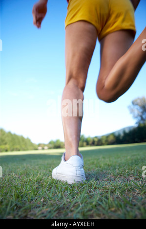 woman's back view running Stock Photo - Alamy
