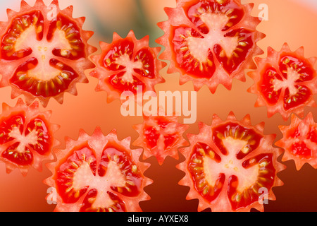 Tomato gear wheels Stock Photo - Alamy