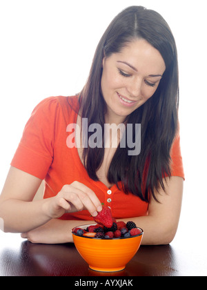 Young Woman Eating Blueberries Model Released Stock Photo - Alamy