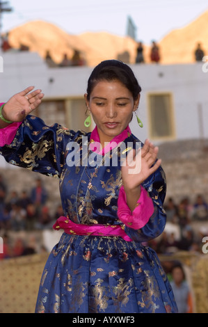 Ladhaki female dancer in traditional dress performing during Ladakh ...