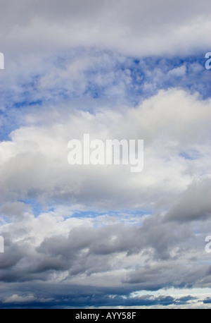 Blue Sky with Fluffy White Clouds Stock Photo - Alamy