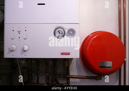 Combination boiler with switches, timer and pressure guage Stock Photo ...