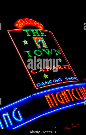 Neon signs entice holidaymakers into the bars and cabaret shows in ...
