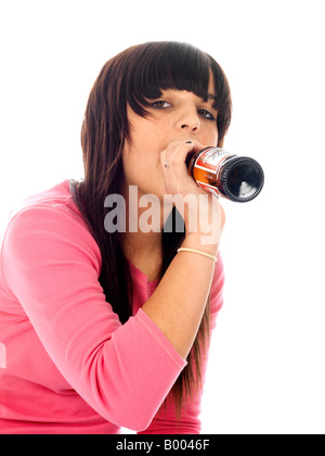 Young woman binge drinking from a bottle, she's drinking Hooch an ...