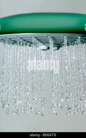 SHOWER HEAD WATER SPRAYING OUT OF IN BATHROOM Stock Photo - Alamy
