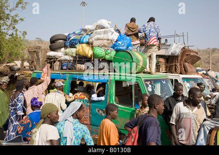 Mali, Bamako. A busy scene at one of Bamako’s country bus stations ...