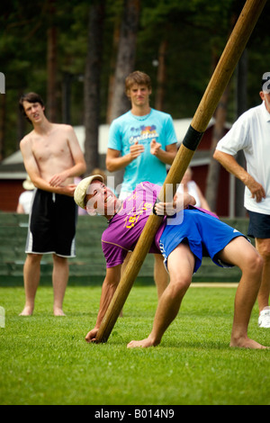 throwing heavy poles at the gotland games in Sweden Stock Photo - Alamy
