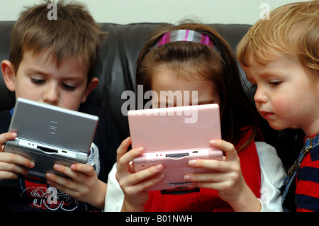 Children play Nintendo DS lite computer game Stock Photo - Alamy