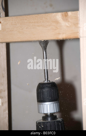 Drilling through the frame Stock Photo - Alamy
