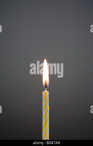 Single birthday candle Stock Photo - Alamy